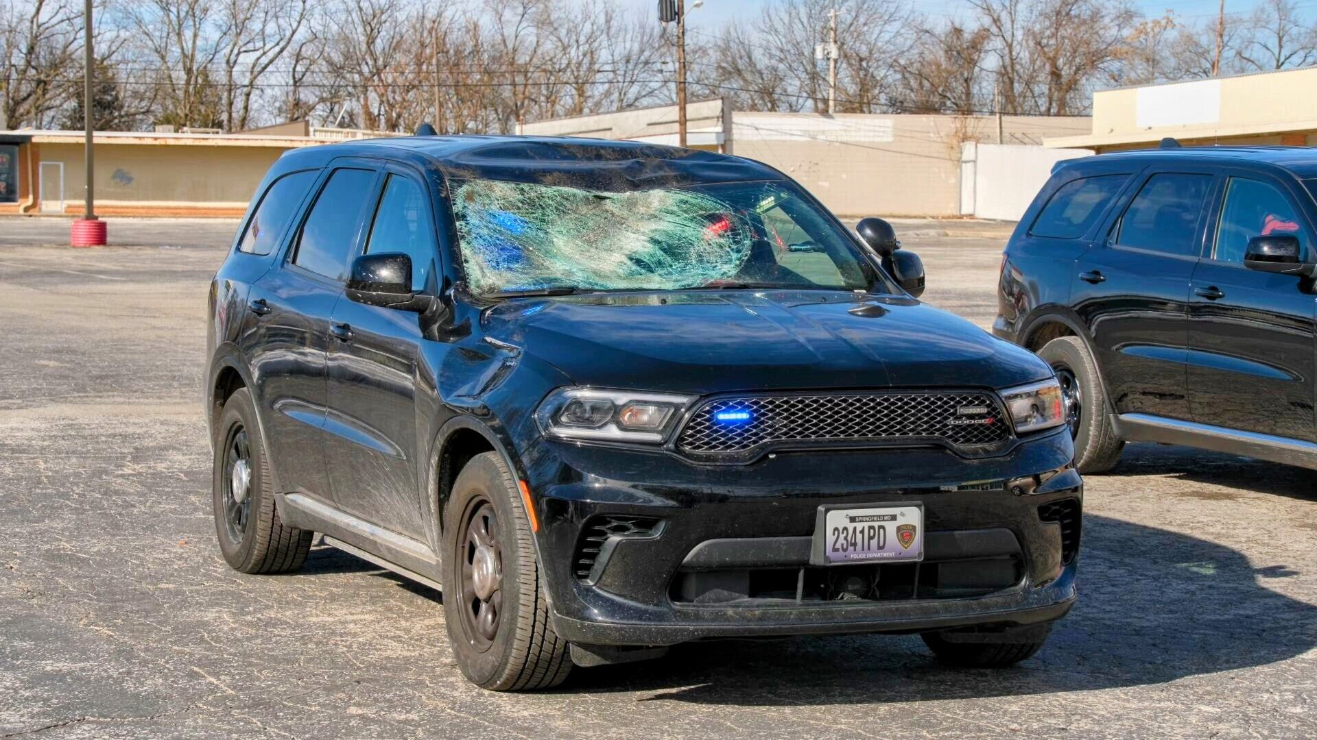 Springfield Police patrol car hit by falling 8-foot chunk of ice