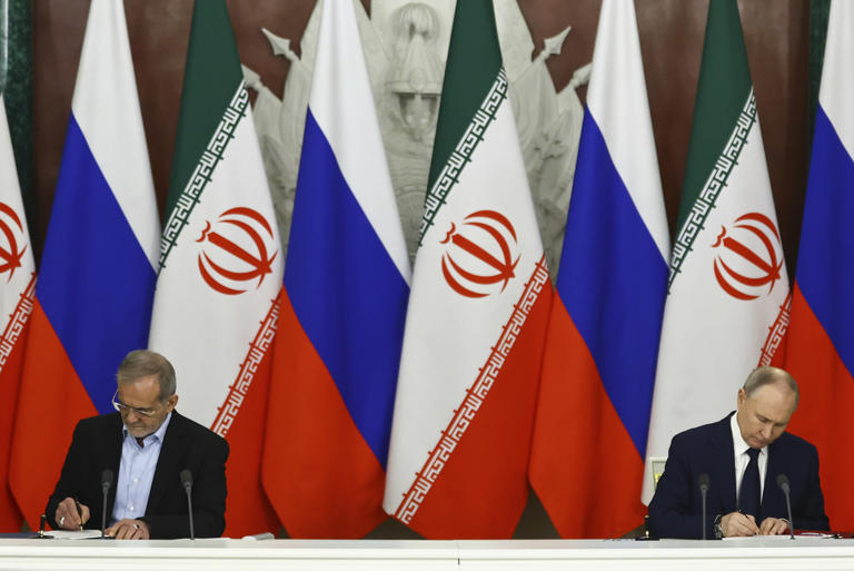 Russia and Iran sign a partnership treaty to deepen their ties in the ...