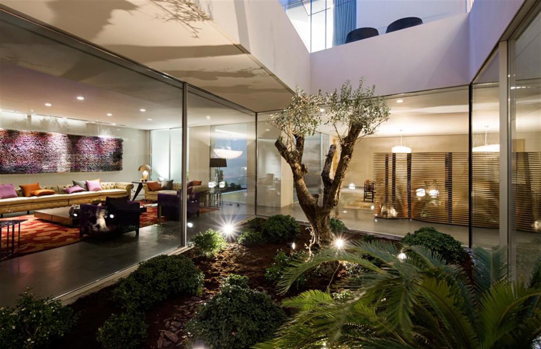 Explore 9 ENCHANTING secret gardens hidden within beautiful homes