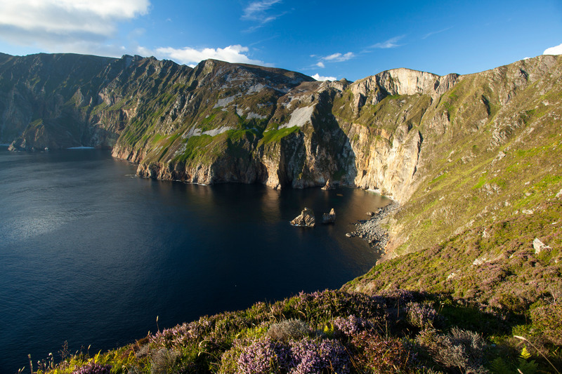 Pair accused of murdering man and throwing body off cliff each claim ...