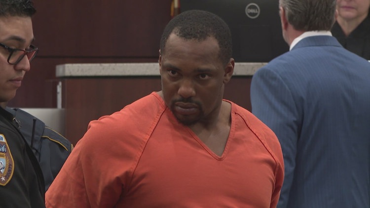 $600,000 bonds lowered for ex-football star charged with strangling ...
