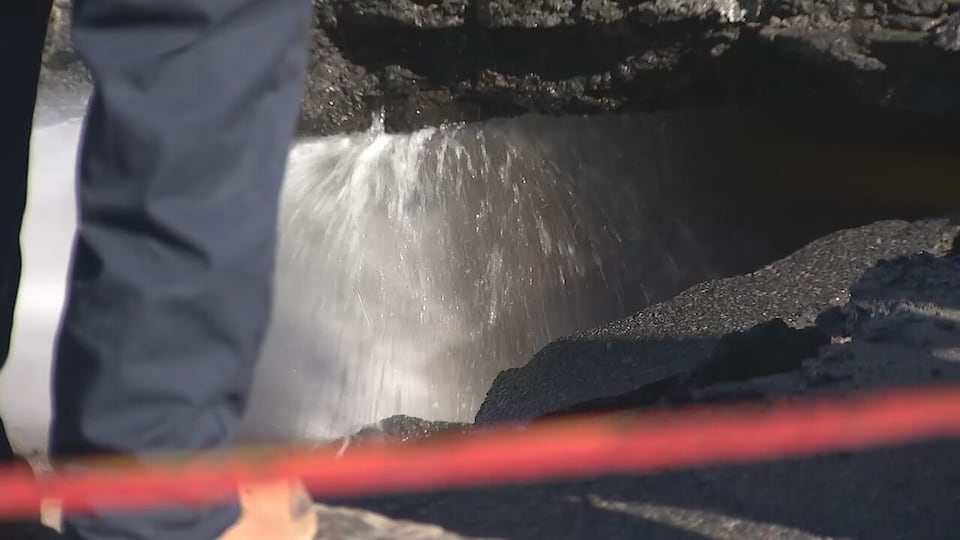 Water back on but road closed over main break outside busy Atlanta ...