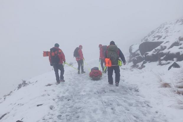 Snow rescue used stretcher as a sledge near Dovestone