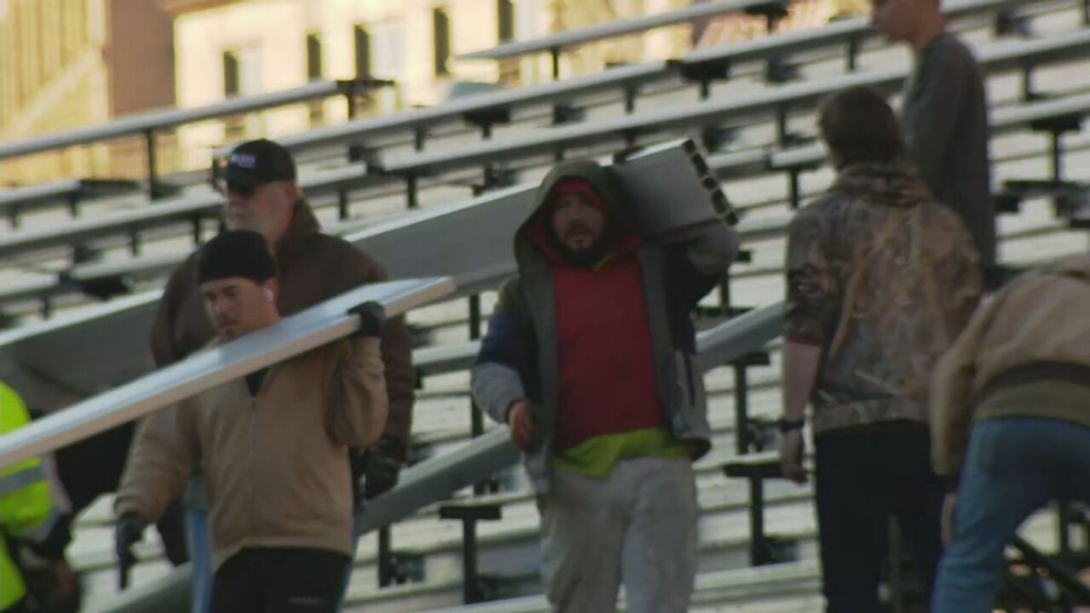 Crews scramble to take down bleachers, fencing after inauguration gets ...