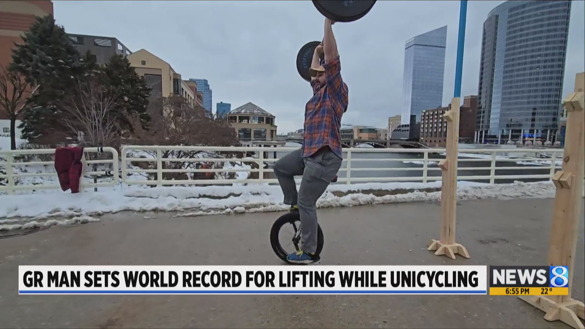 World record set as GR man lifts 206 pounds while riding unicycle