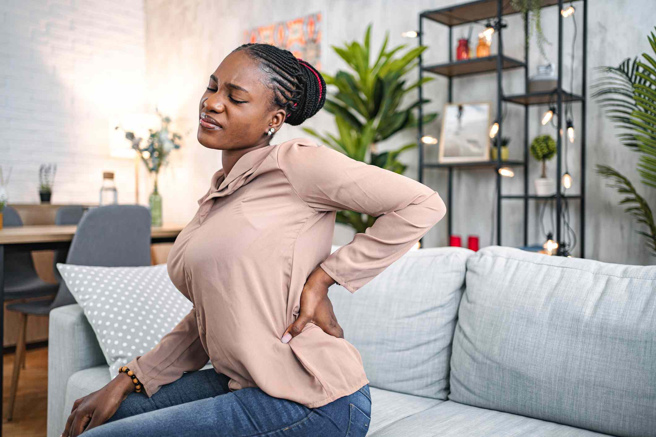 Why you experience back pain before your period and how to manage it
