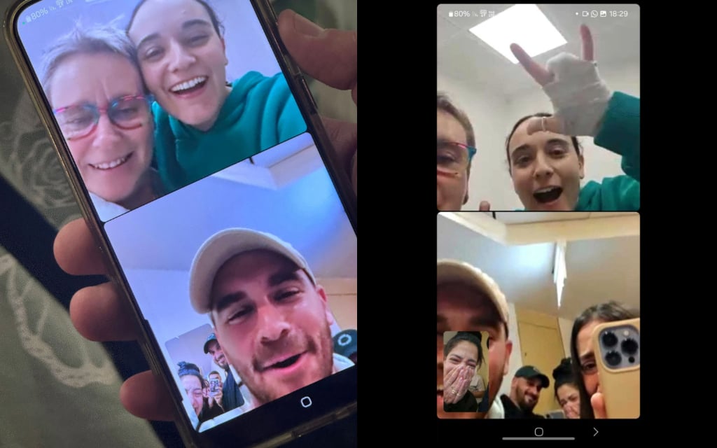 Smiling Emily Damari reunites with mother, holds up hand with two ...