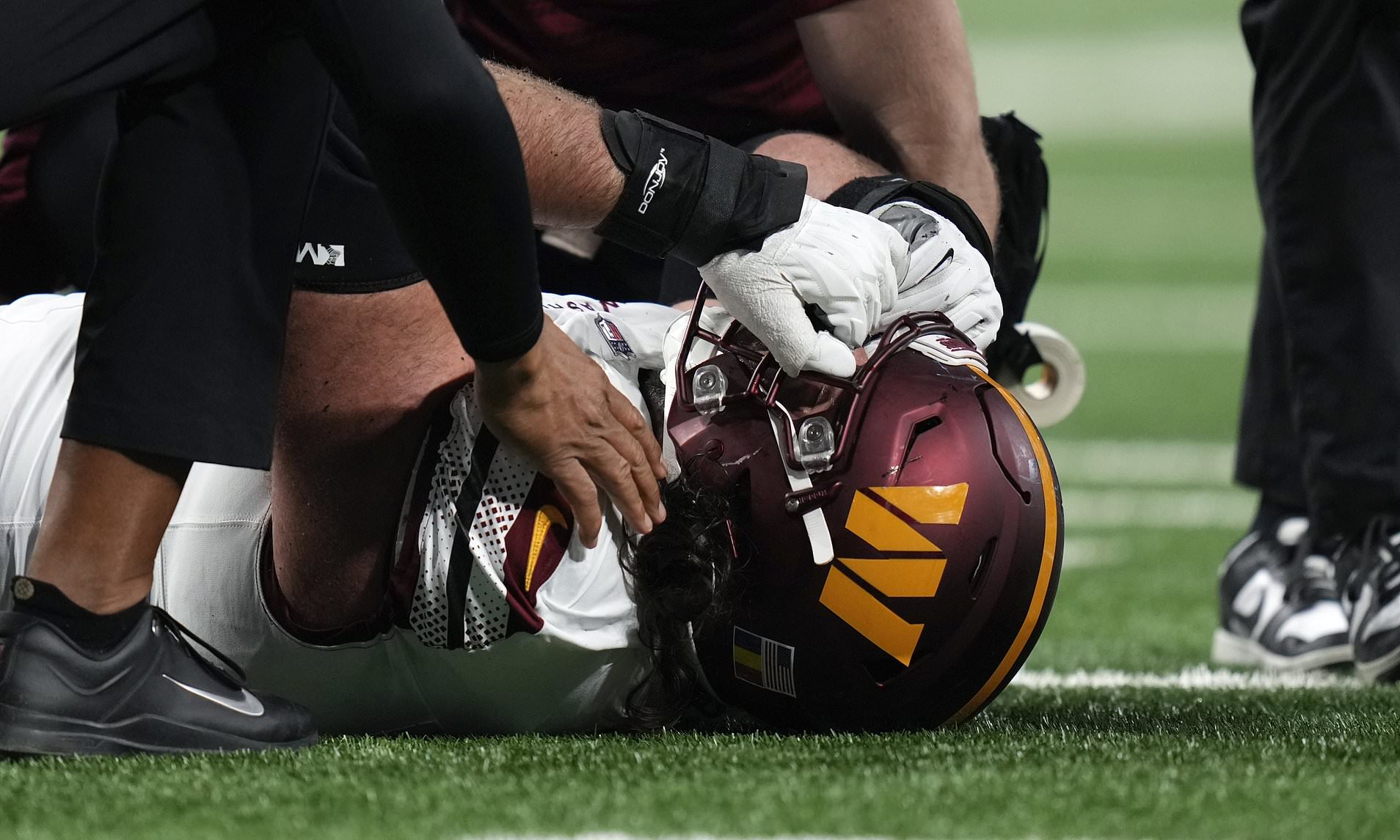 Commanders lose star man Sam Cosmi to torn ACL in devastating blow ...