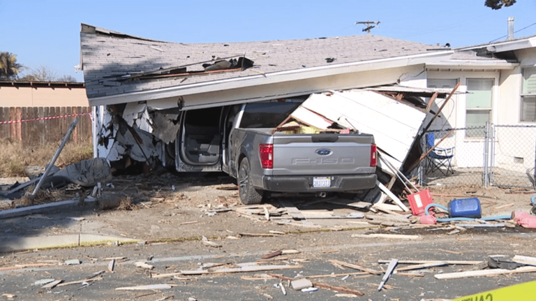 Pickup truck crashes into El Cajon home, collapses garage