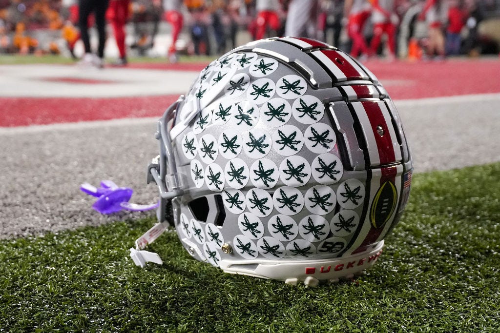 Why does Ohio State have stickers on football helmets? Explaining ...