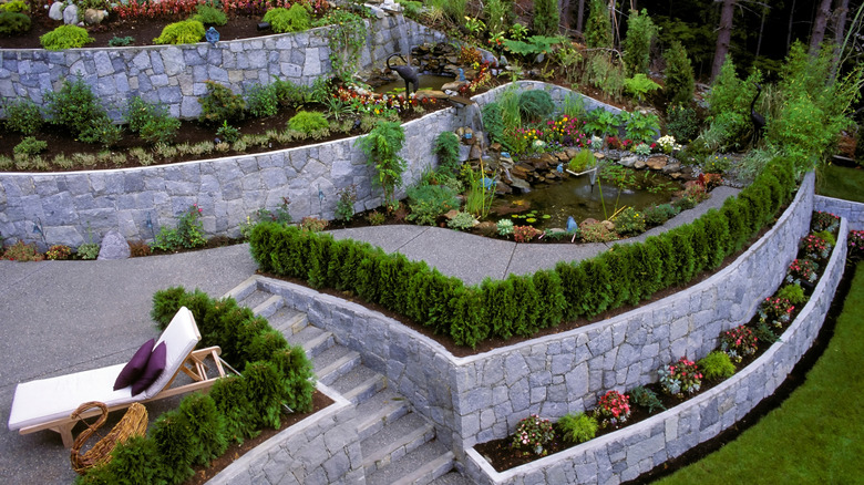 7 Ideas To Turn Your Retaining Wall Into A Fabulous, Functional ...