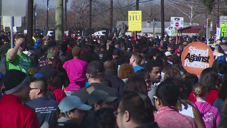 Thousands brave the cold weather to march in honor of Dr. Martin Luther ...