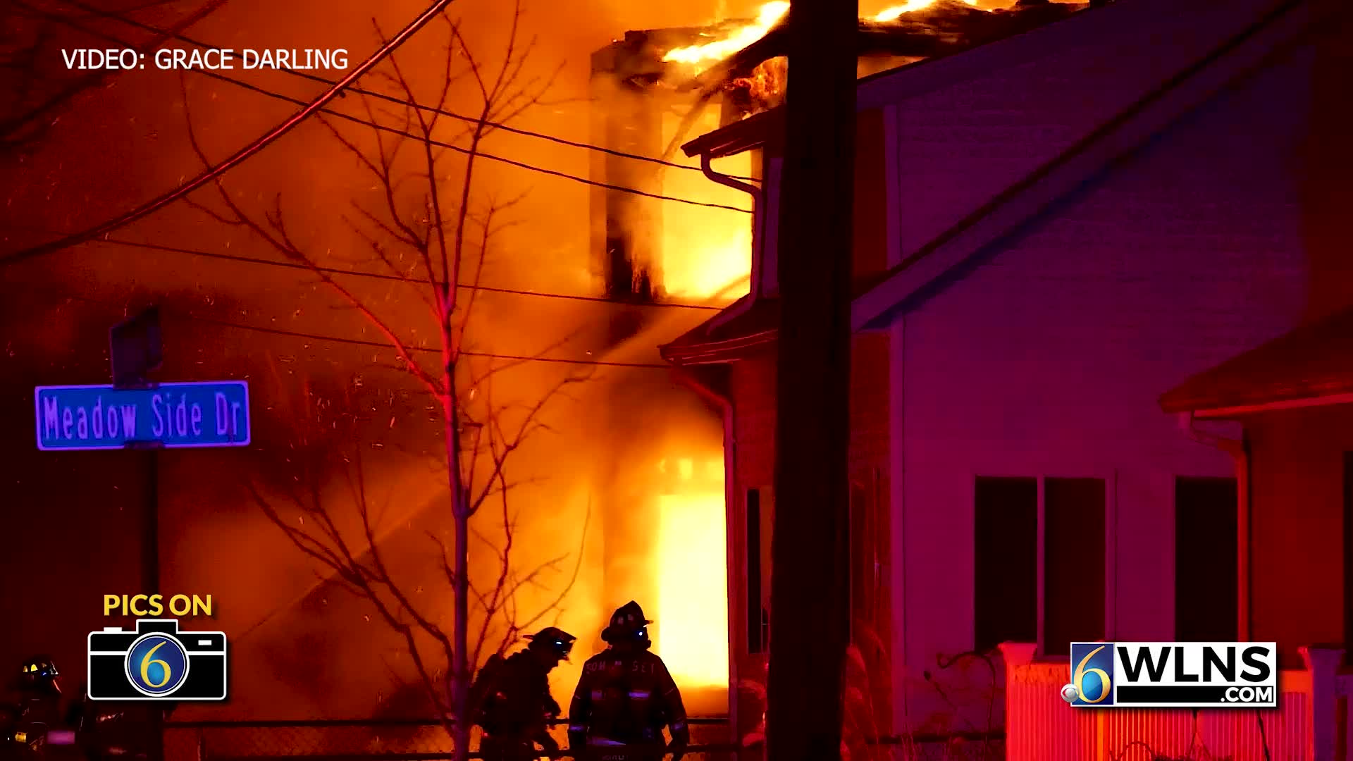 Firefighters respond to large house fire in Jackson County on Clark Lake