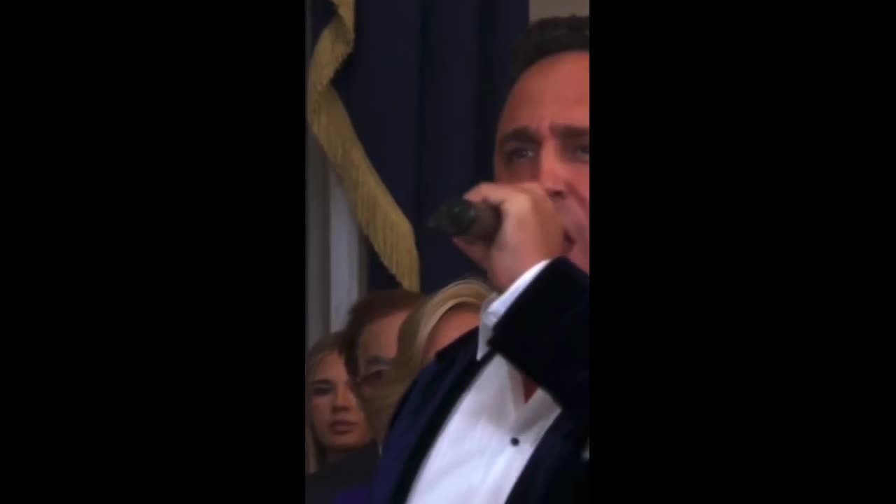 Opera singer Christopher Macchio performs the National Anthem during ...