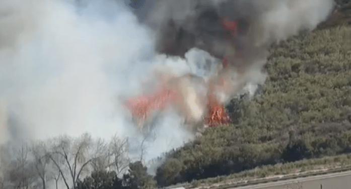 Evacuations lifted after crews douse brush fire near homes in Poway