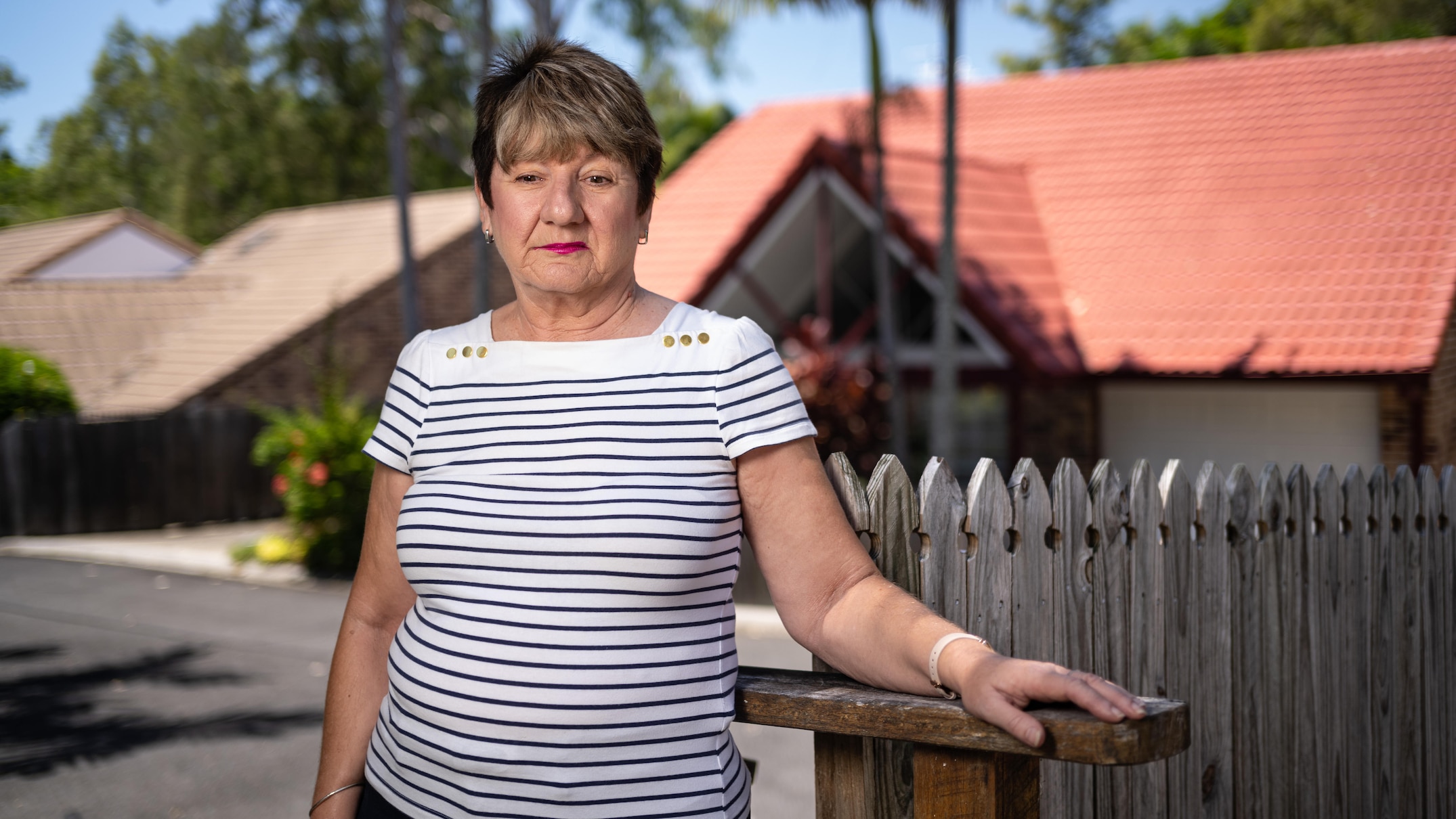 Brisbane body corporate's legal threats over roof painted wrong colour