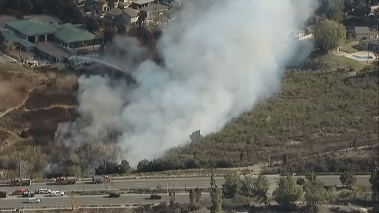 Brush fire sparks in Poway amid red flag warning