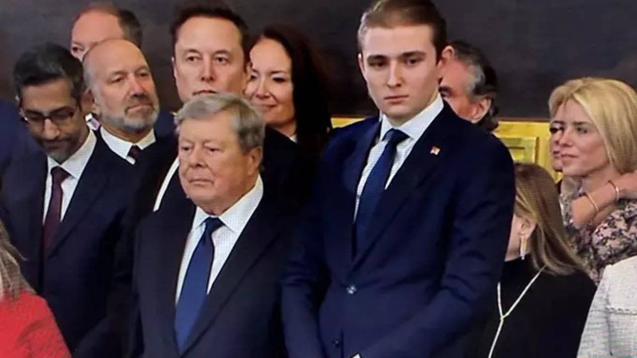 Who Is Standing Next To Barron Trump On Stage At Inauguration?