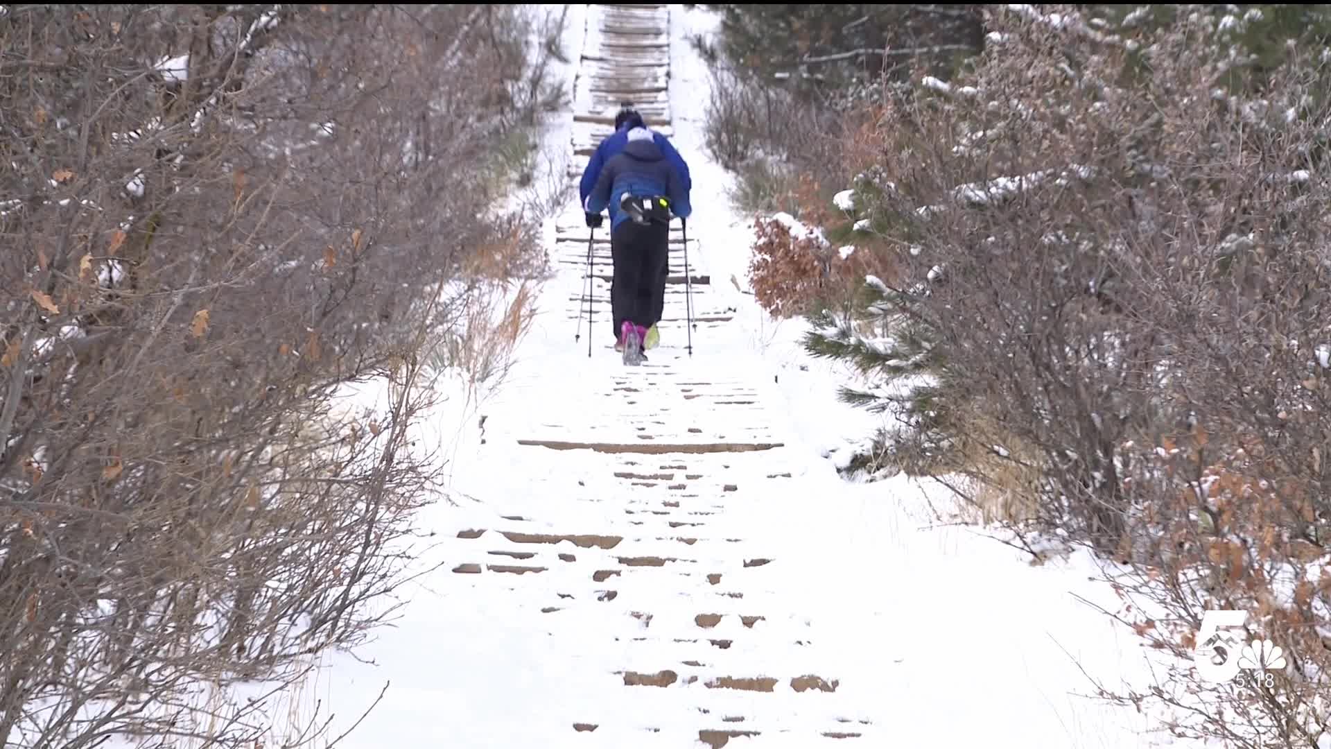 Hikers brave the cold and snow on the Manitou Incline Monday