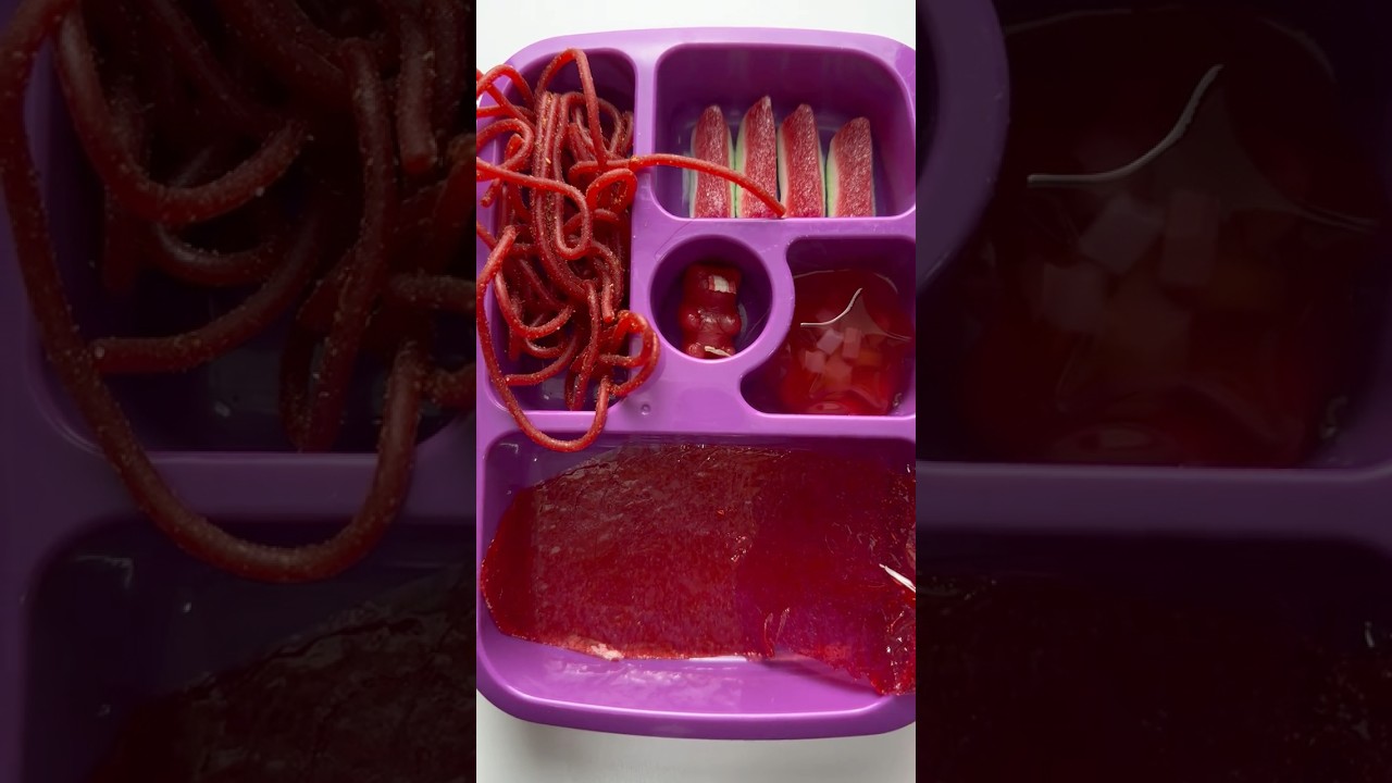 Packing school lunch with only red-colored food