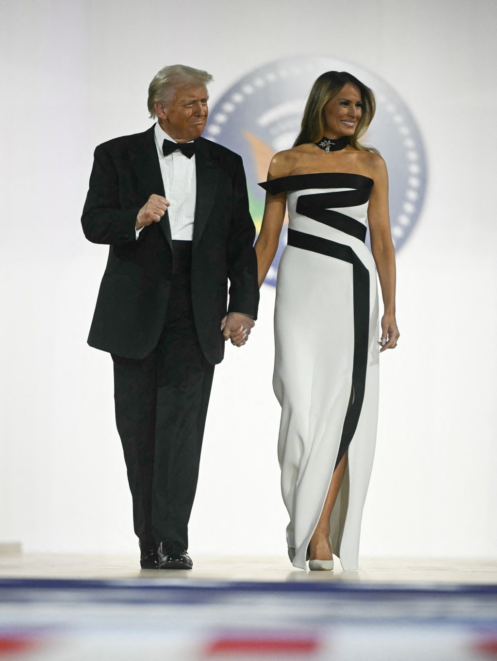 Trump, Melania take the stage to massive ovation for Commander in Chief ...
