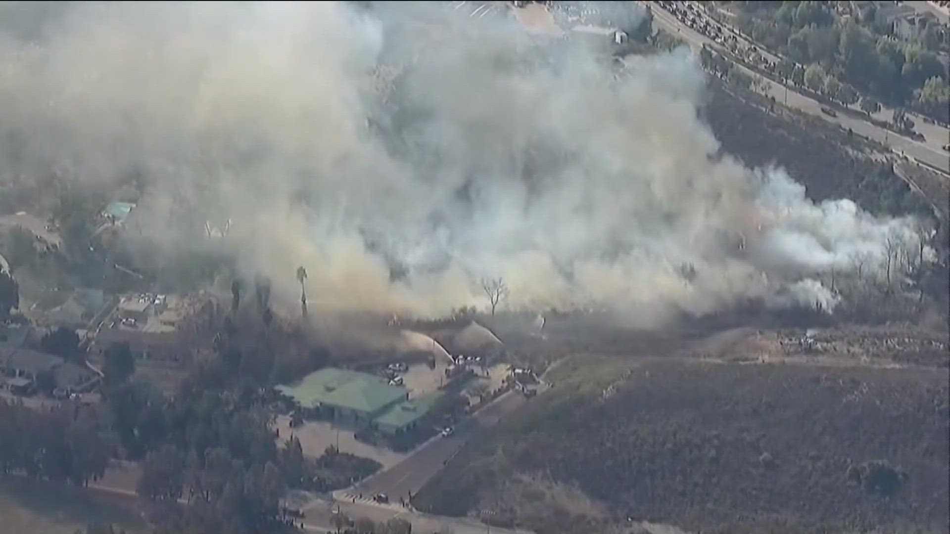 Brush fire threatens homes in Poway amid Red Flag Warning
