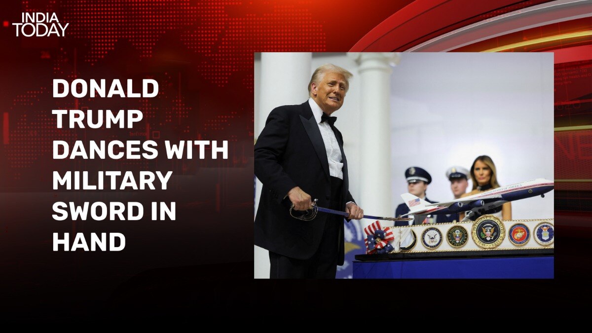 Donald Trump dances with military sword in hand at inaugural ball event