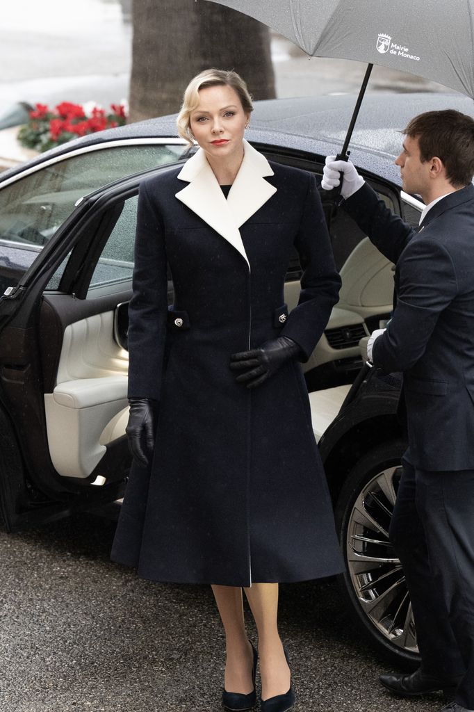 Princess Charlene could be a model in silhouette-lengthening coat