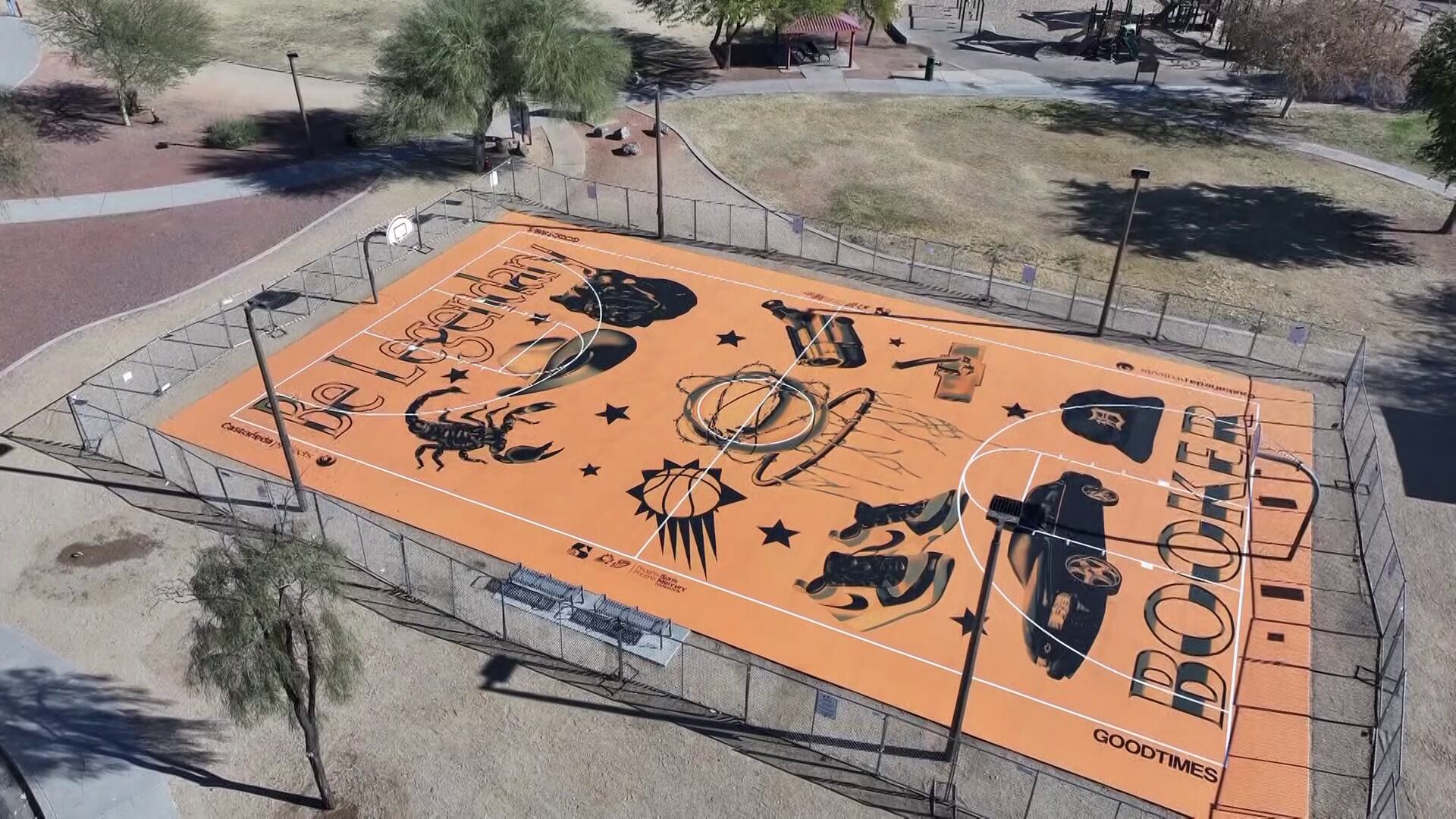 Devin Booker’s charity helps renovate Phoenix basketball court