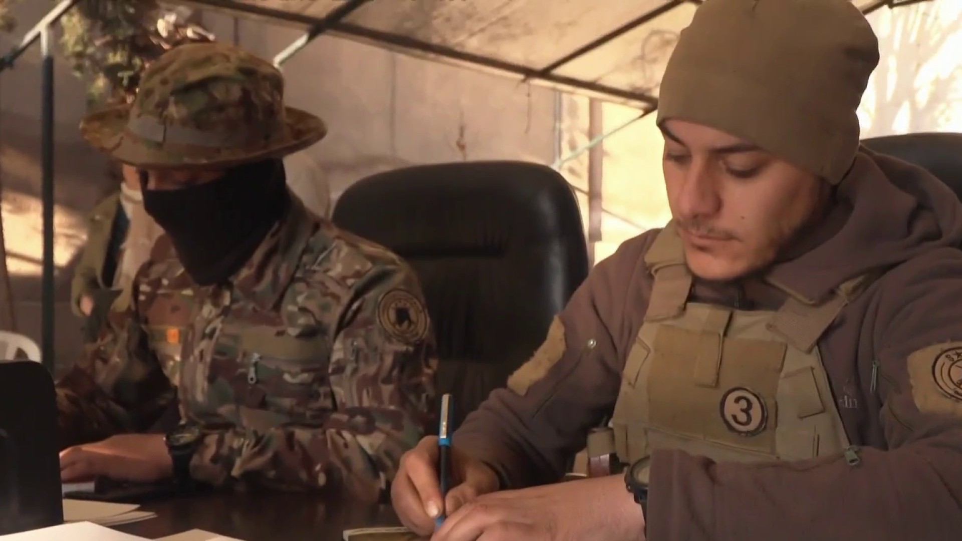 Former Assad soldiers turn in weapons and register as civilians in ...
