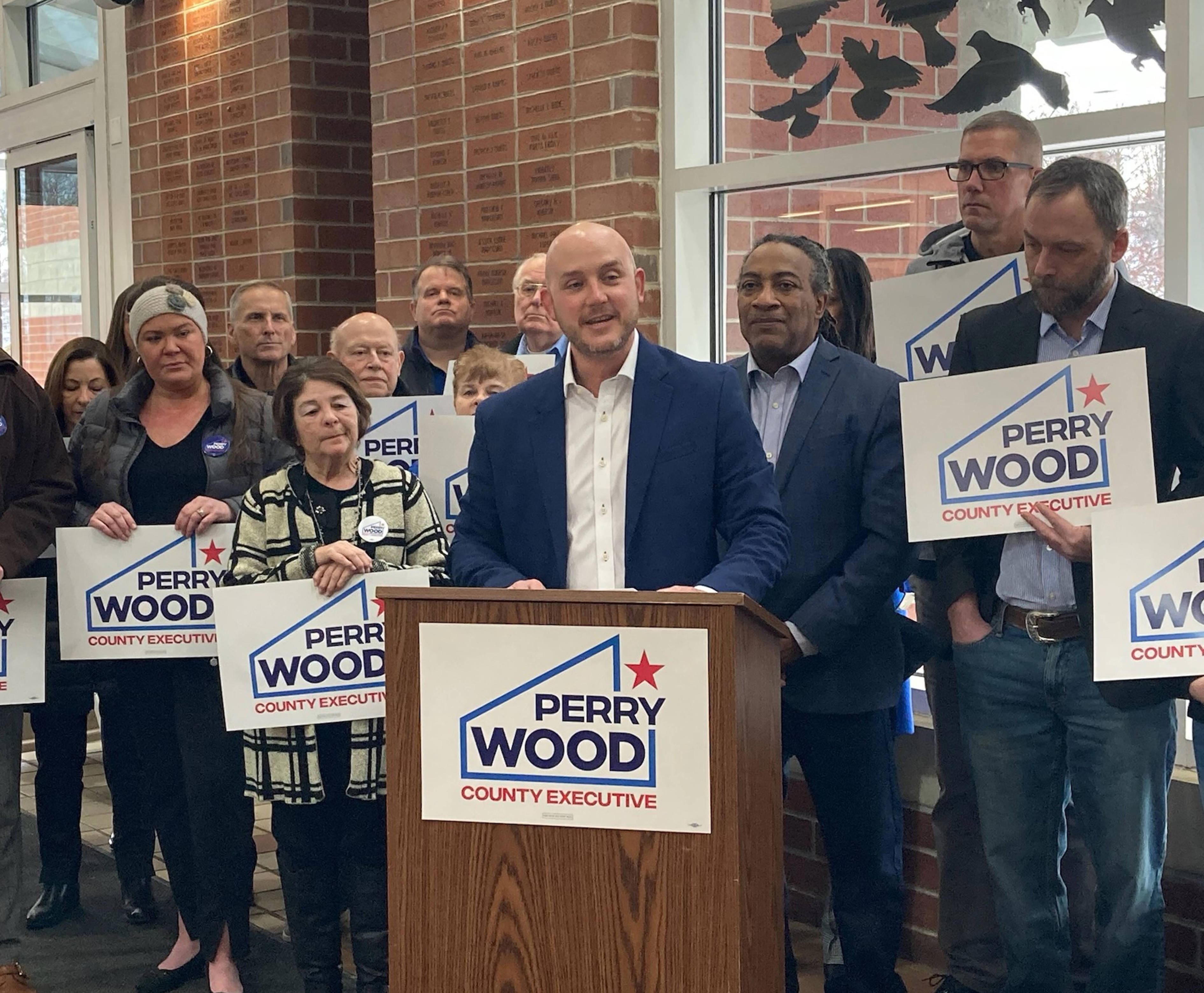 Davis campaign, Perry Wood trade blows over conflict-of-interest accusation