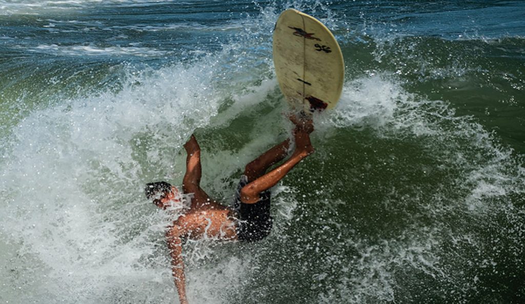 What Keeps Us Surfing After a Disastrous Session?
