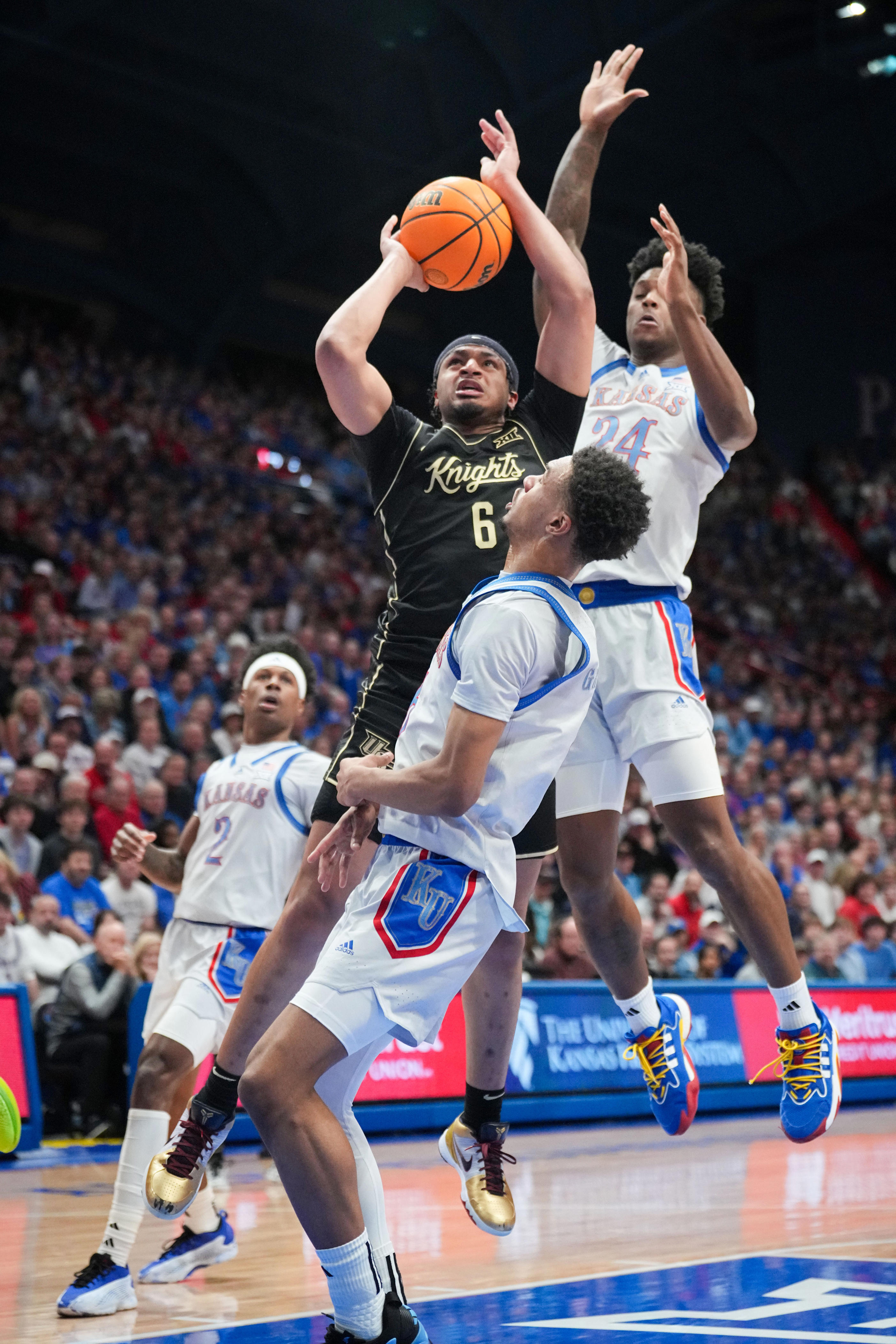 UCF Knights basketball: Upset bid at Kansas undone in paint, with ...