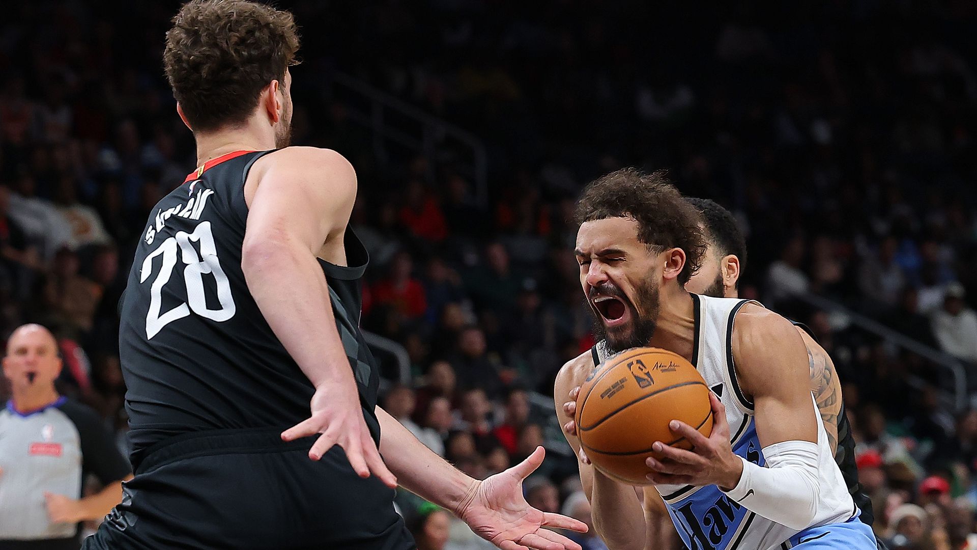 Hawks scream foul in defeat to Rockets, 100-96