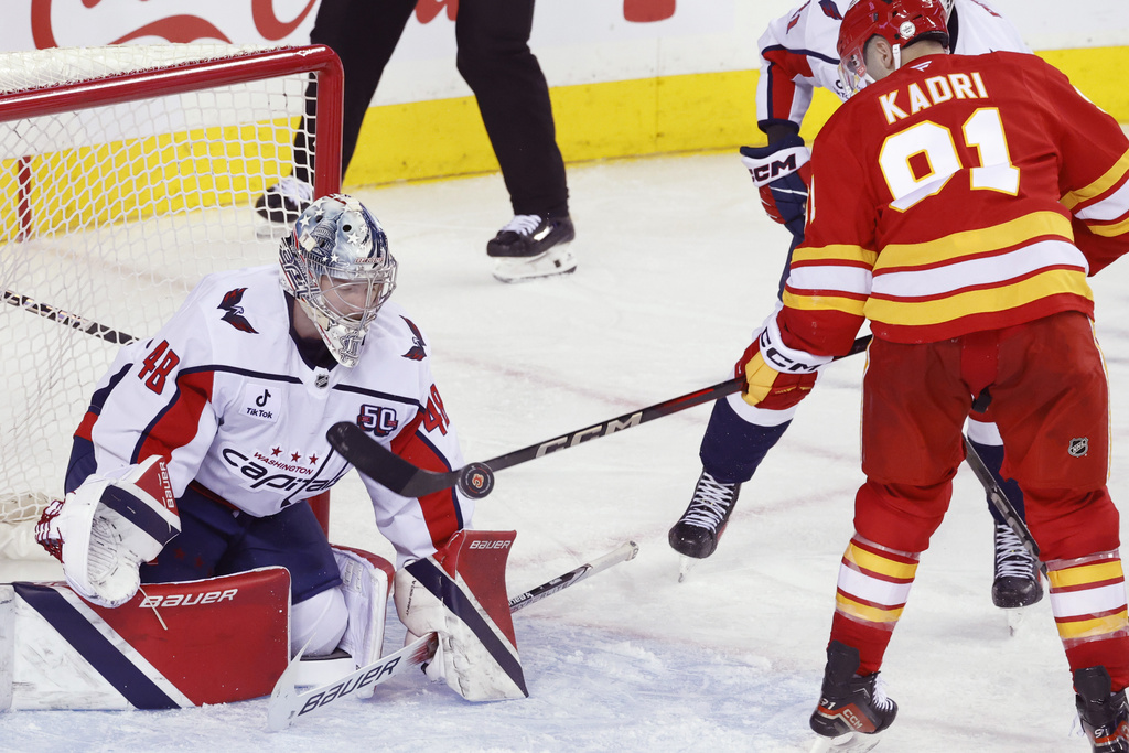 Logan Thompson stops 32 shots and Capitals down Flames 3-1