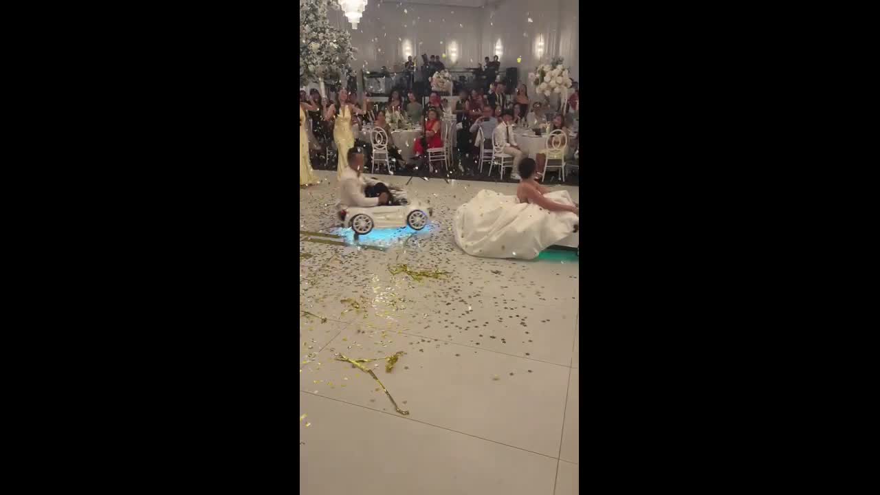 Bride and groom make unique entrance at wedding reception in Sydney ...