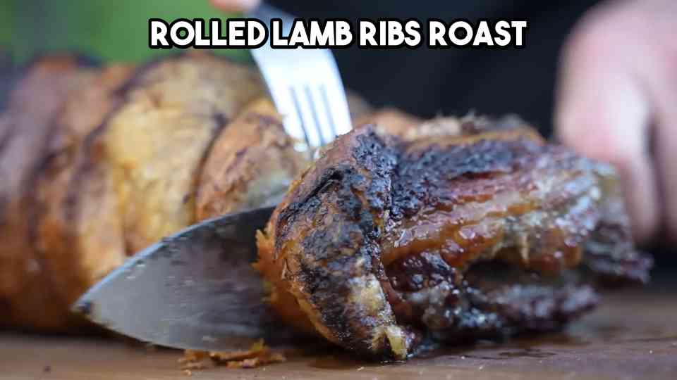 Lamb ribs stuffed and rolled roasted on a spit