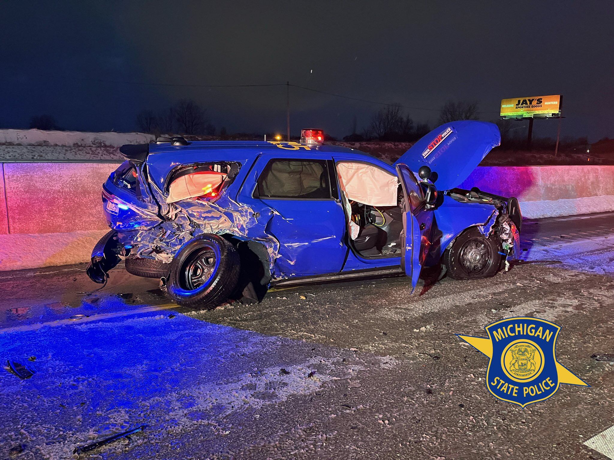 MSP: Patrol car hit while investigating crash on I-75