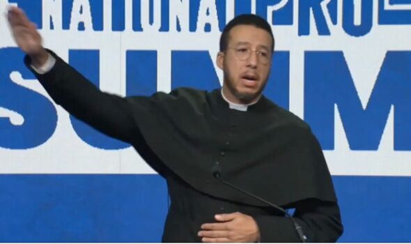 TV priest does 'Elon Musk Nazi salute' to cheering crowd at National ...
