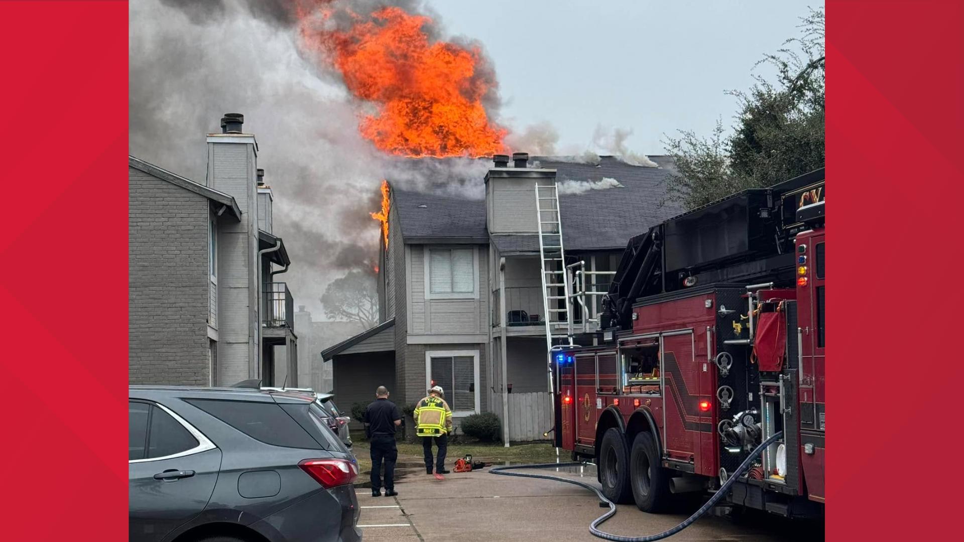 Woman escapes apartment fire by jumping off balcony
