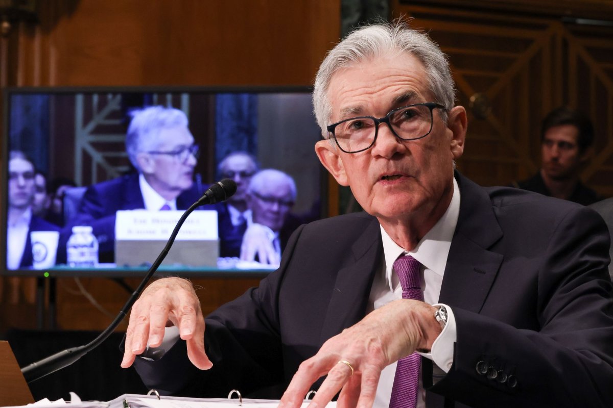 Federal Reserve keeps interest rates unchanged, defies Trump