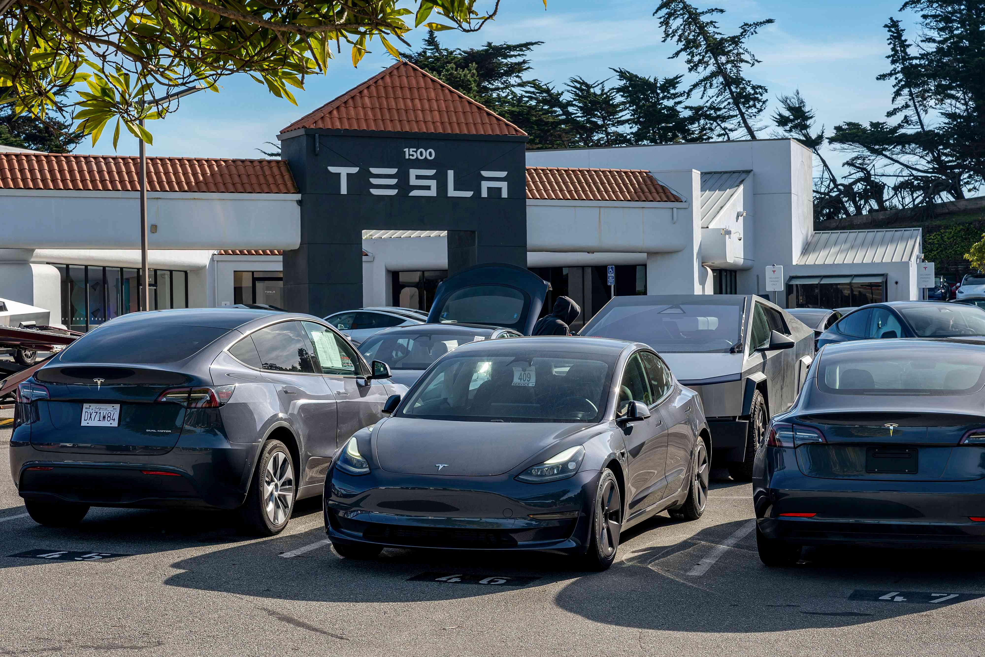 Tesla Revenue, Adjusted Profit Fall Short; EV Maker Sees 2025 Delivery ...