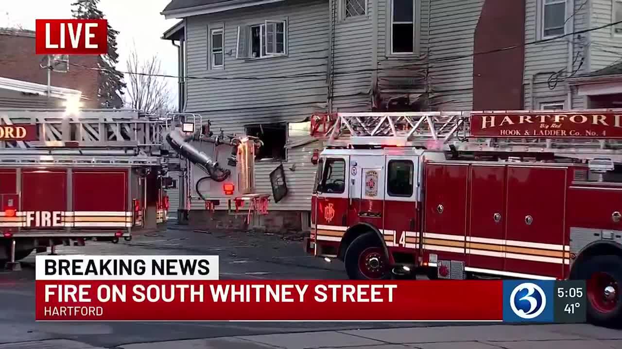Firefighters battle multi-family house fire in Hartford