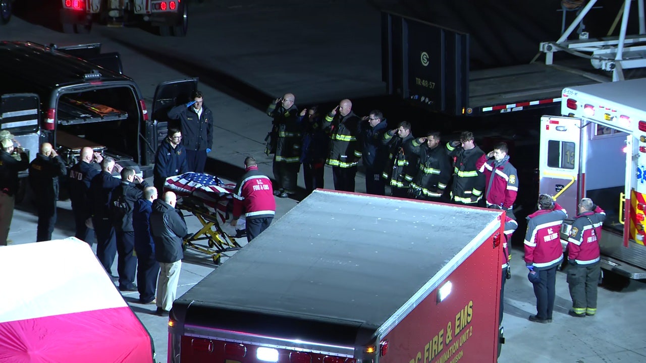 DC plane crash: Flag draped remains honored by first responders