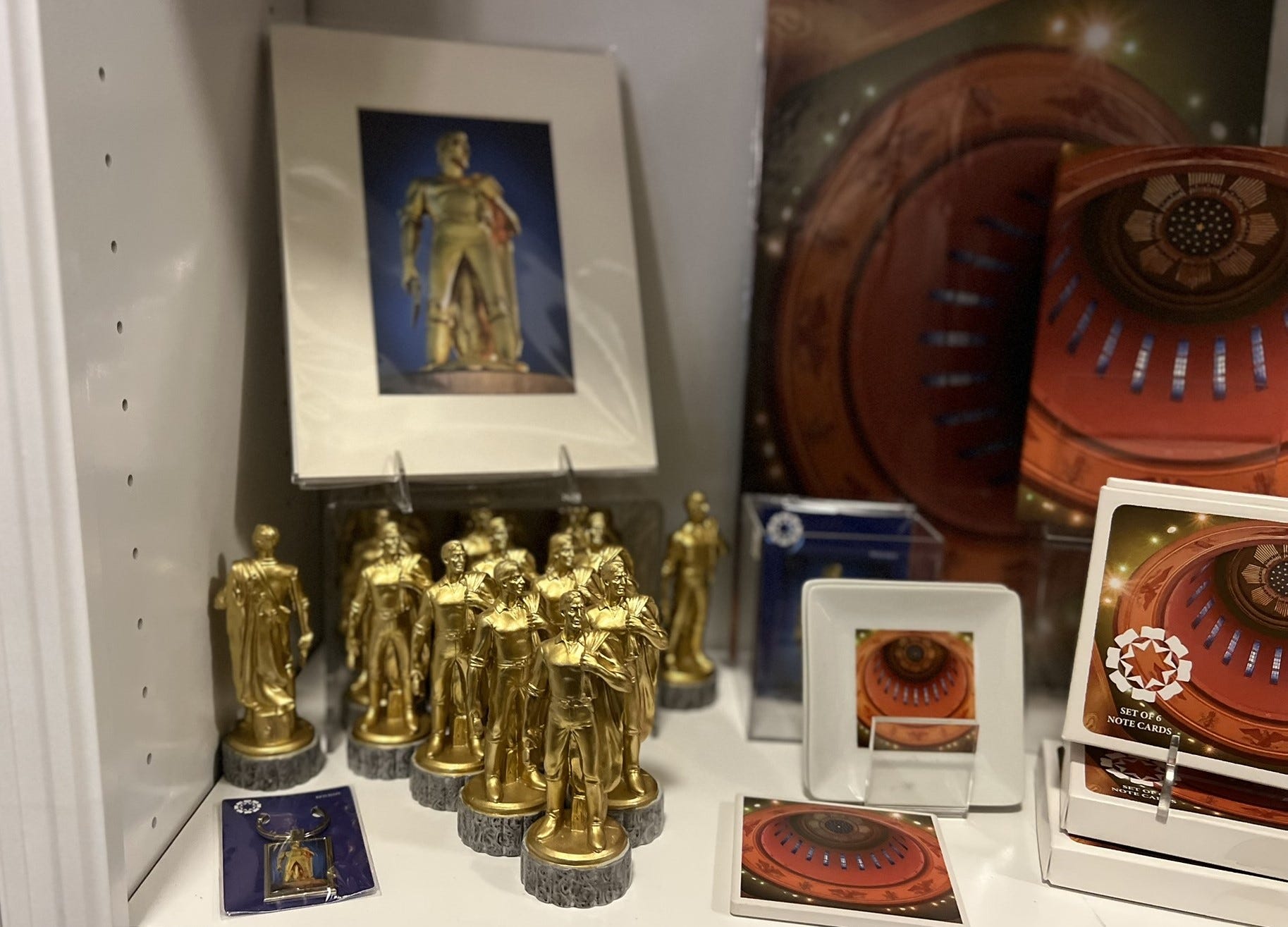 Oregon Capitol carpet items and other exclusives on shelves of pop-up store