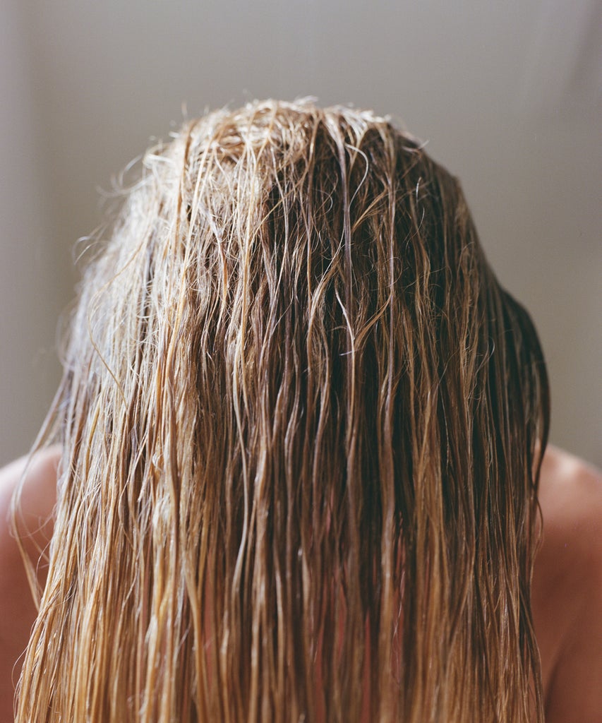 Why your hair looks oily right after you wash it (& what to do about it)