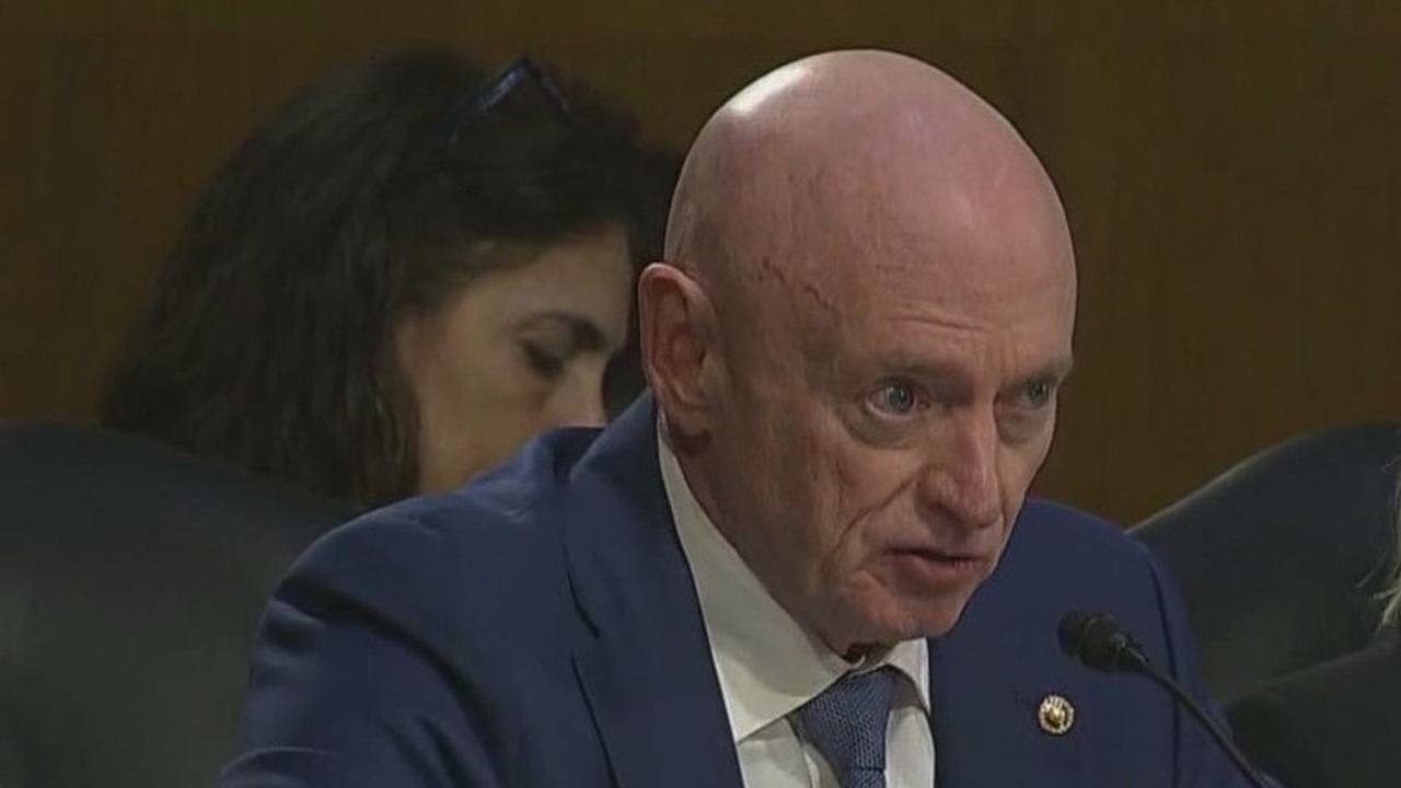 Sen. Mark Kelly grills Tulsi Gabbard on Snowden