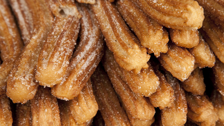 The History Of Churros Is Much More Mysterious Than We Thought