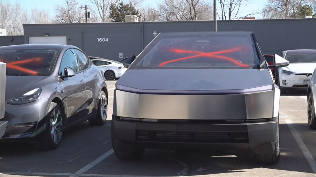 Colorado Tesla dealership vandalized with "offensive" graffiti, broken ...
