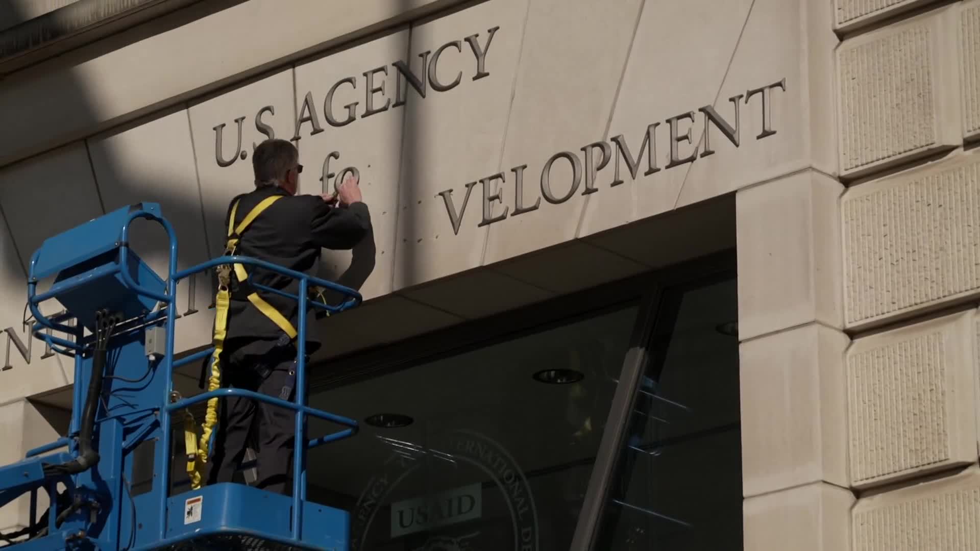 Signage for USAID removed and covered at its DC headquarters